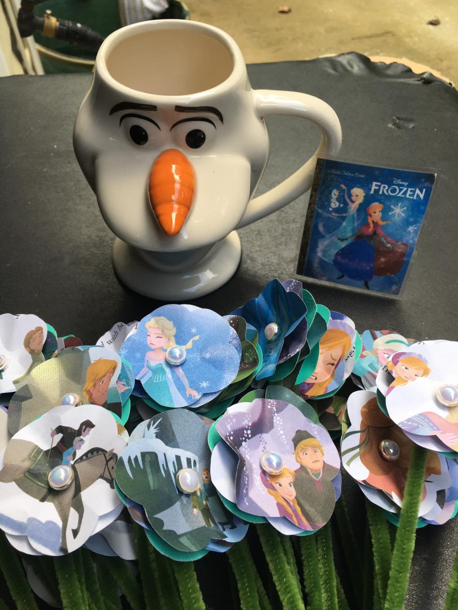 Frozen little golden book hand-cut paper flower arrangement in Olaf mug - Eventeny